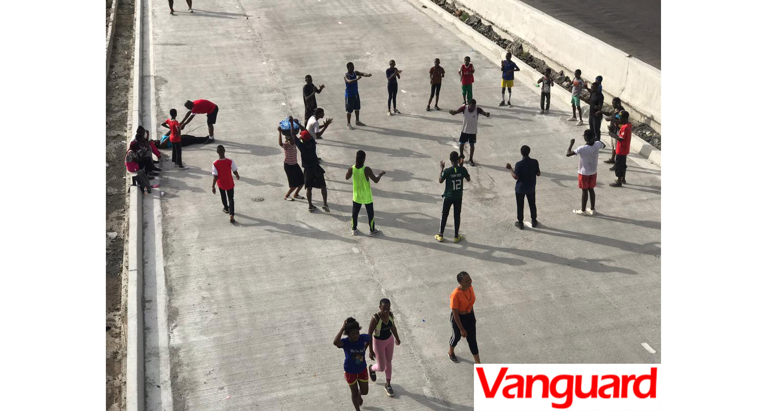 Lagosians on Gbagada expressway keeping fit amidst lockdown