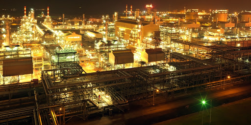 Buhari urges commitment as NLNG signs Train 7 project construction